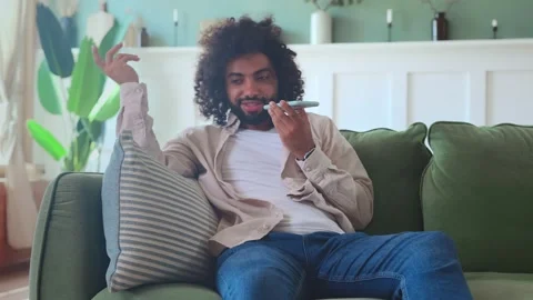 Young sociable Indian man makes phone ca... | Stock Video | Pond5