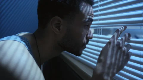 Young Soldier Looking Out Of Window At N... | Stock Video | Pond5