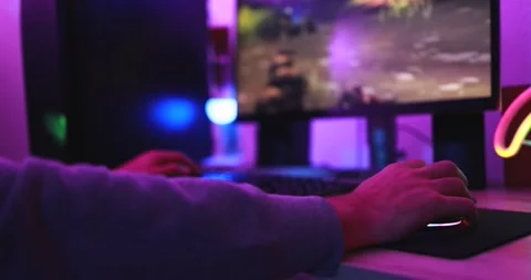 Young streamer gamer playing at strategy... | Stock Video | Pond5