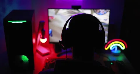 Young streamer gamer playing at strategy... | Stock Video | Pond5