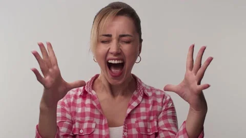 A young stressed blonde hair woman shout... | Stock Video | Pond5