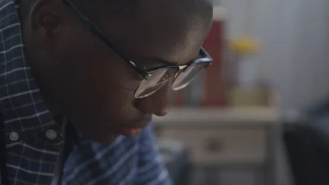 Young Studious Man in Glasses Works on ... | Stock Video | Pond5