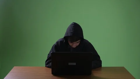Young teenage boy computer hacker agains... | Stock Video | Pond5