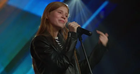 Young teenager girl singer talent is sin... | Stock Video | Pond5