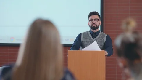 Young university professor is standing a... | Stock Video | Pond5