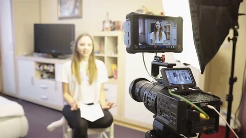 Young vlogger girl talking in to camera ... | Stock Video | Pond5