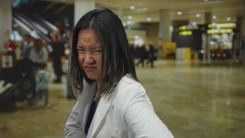 Young woman with a back pain expression ... | Stock Video | Pond5