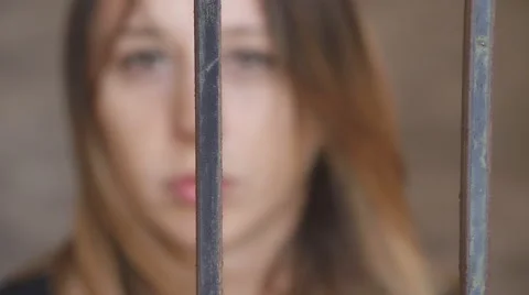 Woman On One Bar Prison Stock Videos – Royalty-Free HD & 4K Videos
