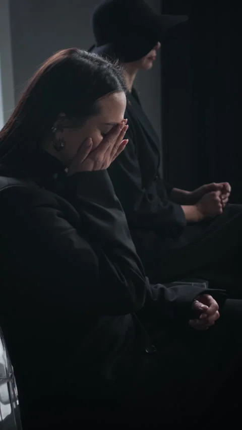 Young Woman in Black Unable to Manage he... | Stock Video | Pond5