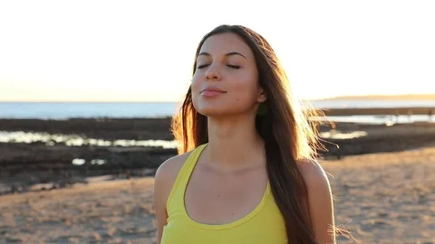 Young woman deep breathing relaxed with ... | Stock Video | Pond5