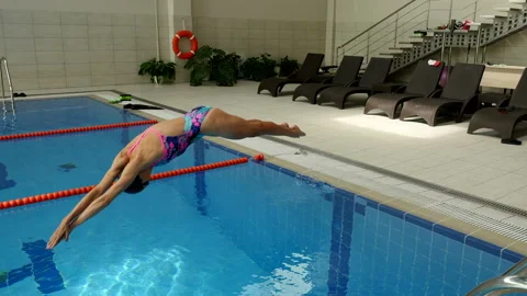 Woman Diving Into Water Stock Footage ~ Royalty Free Stock Videos | Pond5