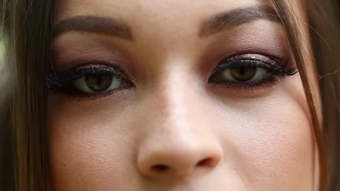 Young woman face looking to camera, pret... | Stock Video | Pond5