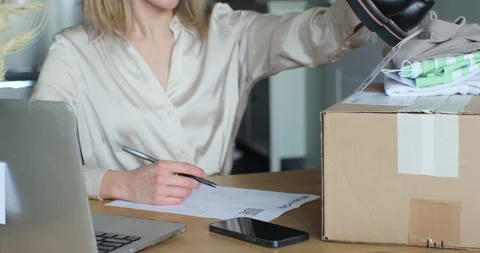 Young woman filling out a paper form, wa... | Stock Video | Pond5