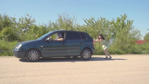 Pushing The Car Stock Videos – Royalty-Free HD & 4K Videos