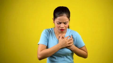 Young woman having heart attack, heart p... | Stock Video | Pond5