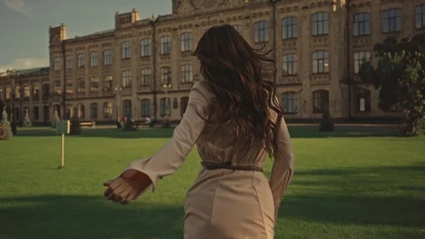 young woman with long hair running on gr... | Stock Video | Pond5