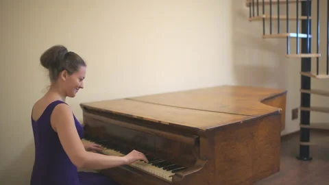 Young woman playing vintage retro piano ... | Stock Video | Pond5