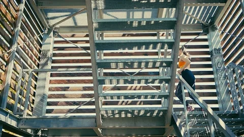 Young woman runner, jump on up the stair... | Stock Video | Pond5