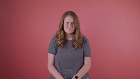 Young Woman Scrunching Face | Stock Video | Pond5