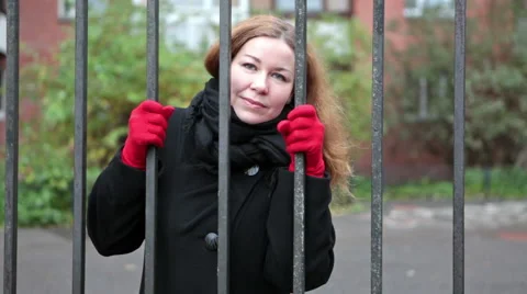 Woman On One Bar Prison Stock Videos – Royalty-Free HD & 4K Videos