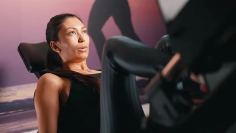 Young woman training legs muscles on leg... | Stock Video | Pond5