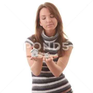 Young woman with two hose models in hands Young woman with two hose ...