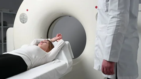 A young woman is undergoing a CT scan pr... | Stock Video | Pond5
