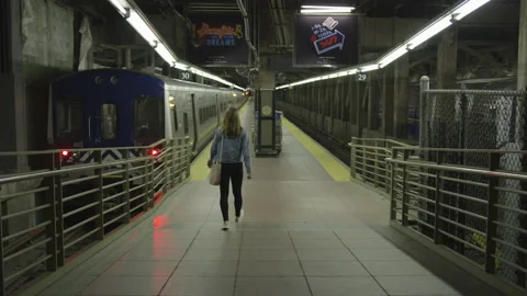 Young Woman Walking Through an Undergrou... | Stock Video | Pond5