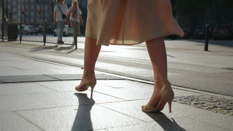 Young woman wearing dress and high heels... | Stock Video | Pond5
