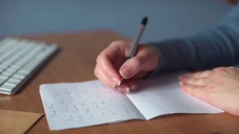 Young woman writing a letter. | Stock Video | Pond5
