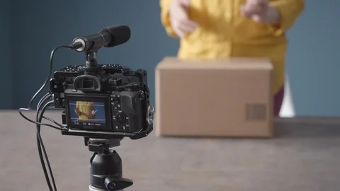 Youtuber making a unboxing video for her... | Stock Video | Pond5