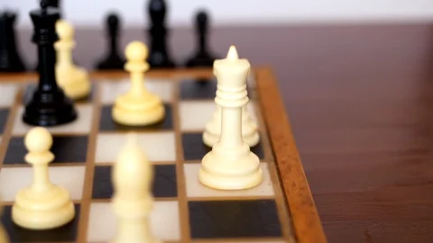 Yuriy Chess pieces. Chess board from har... | Stock Video | Pond5