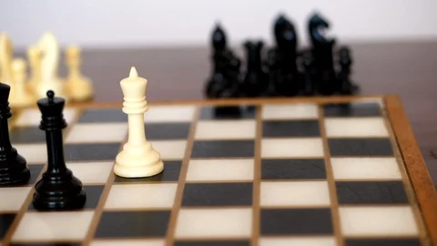 Yuriy Chess pieces. Chess board from har... | Stock Video | Pond5