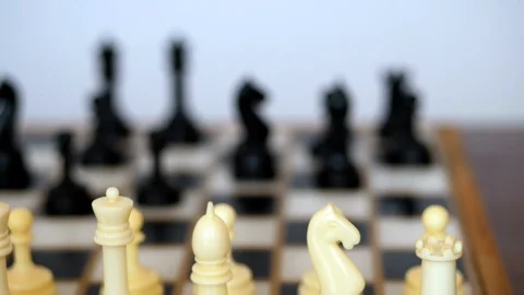 Yuriy Chess pieces. Chess board from har... | Stock Video | Pond5