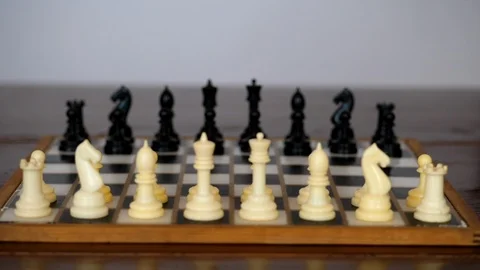 Yuriy Chess pieces. Chess board from har... | Stock Video | Pond5