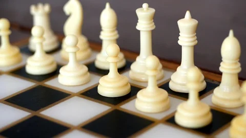 Yuriy Chess pieces. Chess board from har... | Stock Video | Pond5