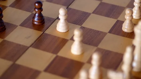 Yuriy Chess pieces. Chess board from har... | Stock Video | Pond5