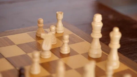 Yuriy Chess pieces. Chess board from har... | Stock Video | Pond5