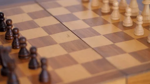 Yuriy Chess pieces. Chess board from har... | Stock Video | Pond5