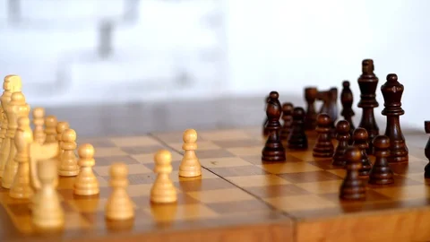 Yuriy Chess pieces. Chess board from har... | Stock Video | Pond5