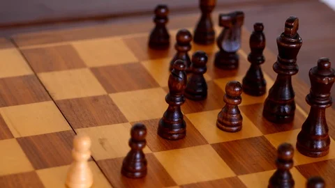 Yuriy Chess pieces. Chess board from har... | Stock Video | Pond5