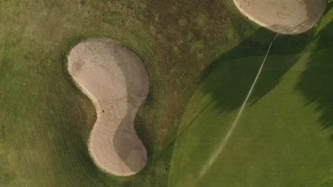 Zenith view of golf course. Bunkers, gre... | Stock Video | Pond5