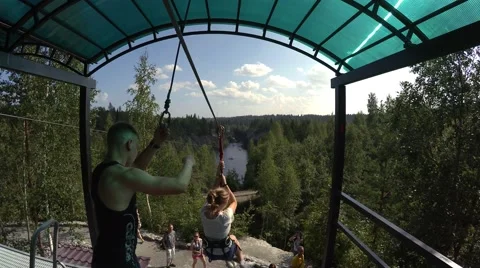 Zip-line. Ropes course, over water. Flyi... | Stock Video | Pond5