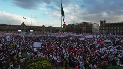 Zocalo Square flag waving at a crowd gat... | Stock Video | Pond5