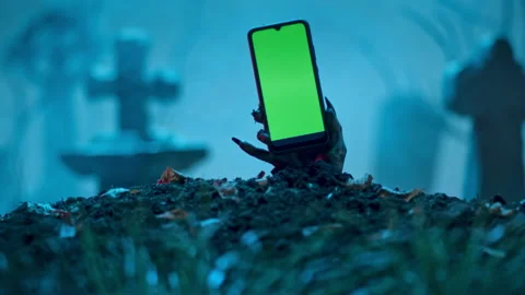 Zombie hand rising up smartphone with gr... | Stock Video | Pond5