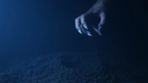 The zombie's hand emerges from the shado... | Stock Video | Pond5