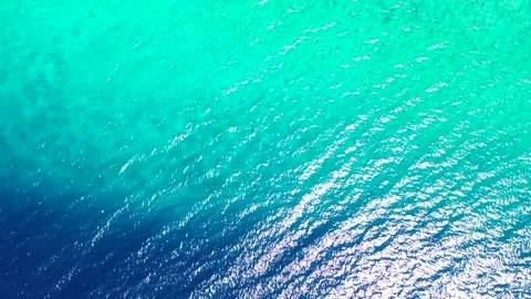Zoom-in, aerial top view of the ocean's ... | Stock Video | Pond5