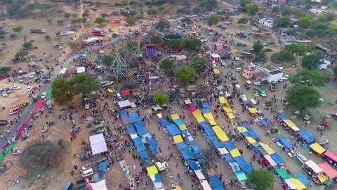 Zoom in aerial view of fun fair in the o... | Stock Video | Pond5