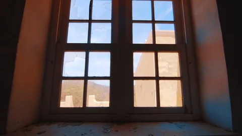 ZOOM IN on broken window with bird dropp... | Stock Video | Pond5