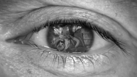Zoom in from a human eye to a scene of a... | Stock Video | Pond5